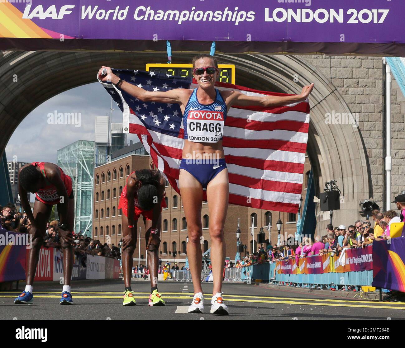 United States' Amy Cragg celebrates with the US flag after winning the ...