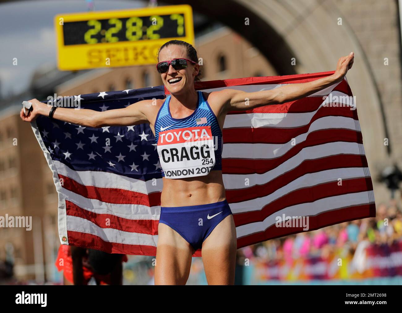 Amy Cragg of the United States celebrates after finishing in bronze ...