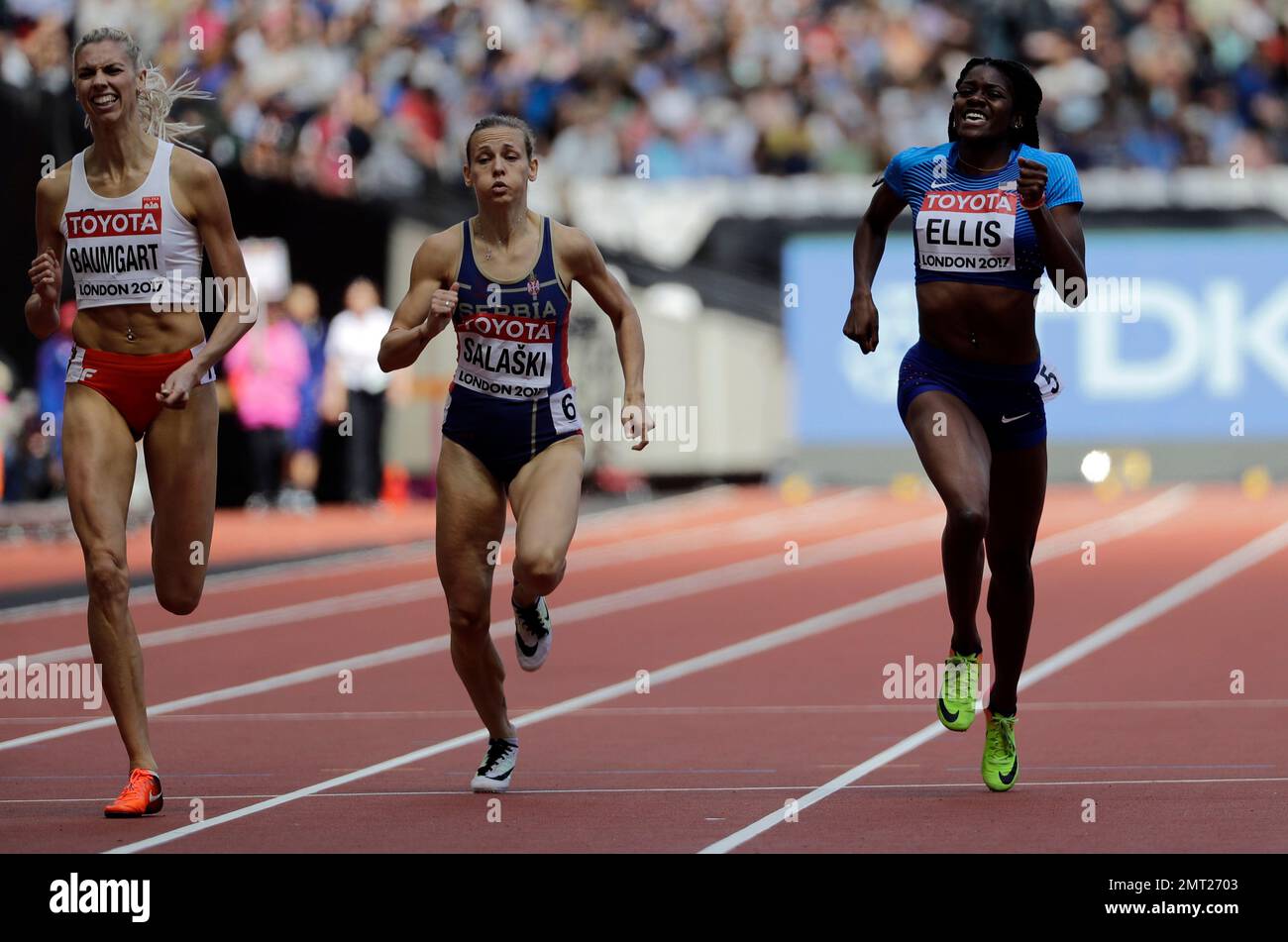 United States' Kendall Ellis, right, races alongside Serbia's Tamara ...