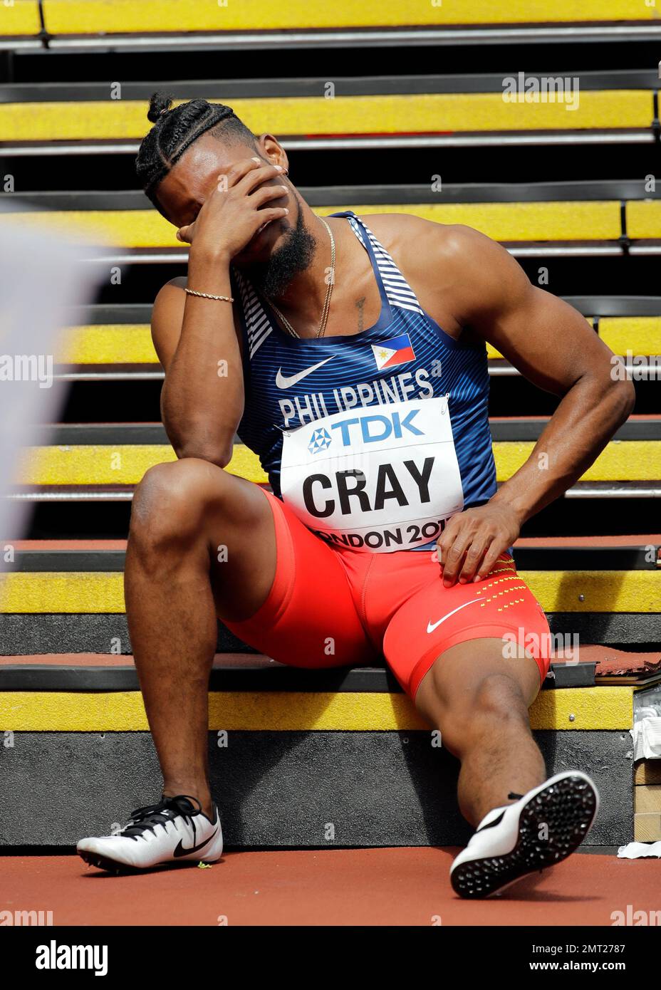 Philippines's Eric Cray reacts after he was disqualified from a Men's ...