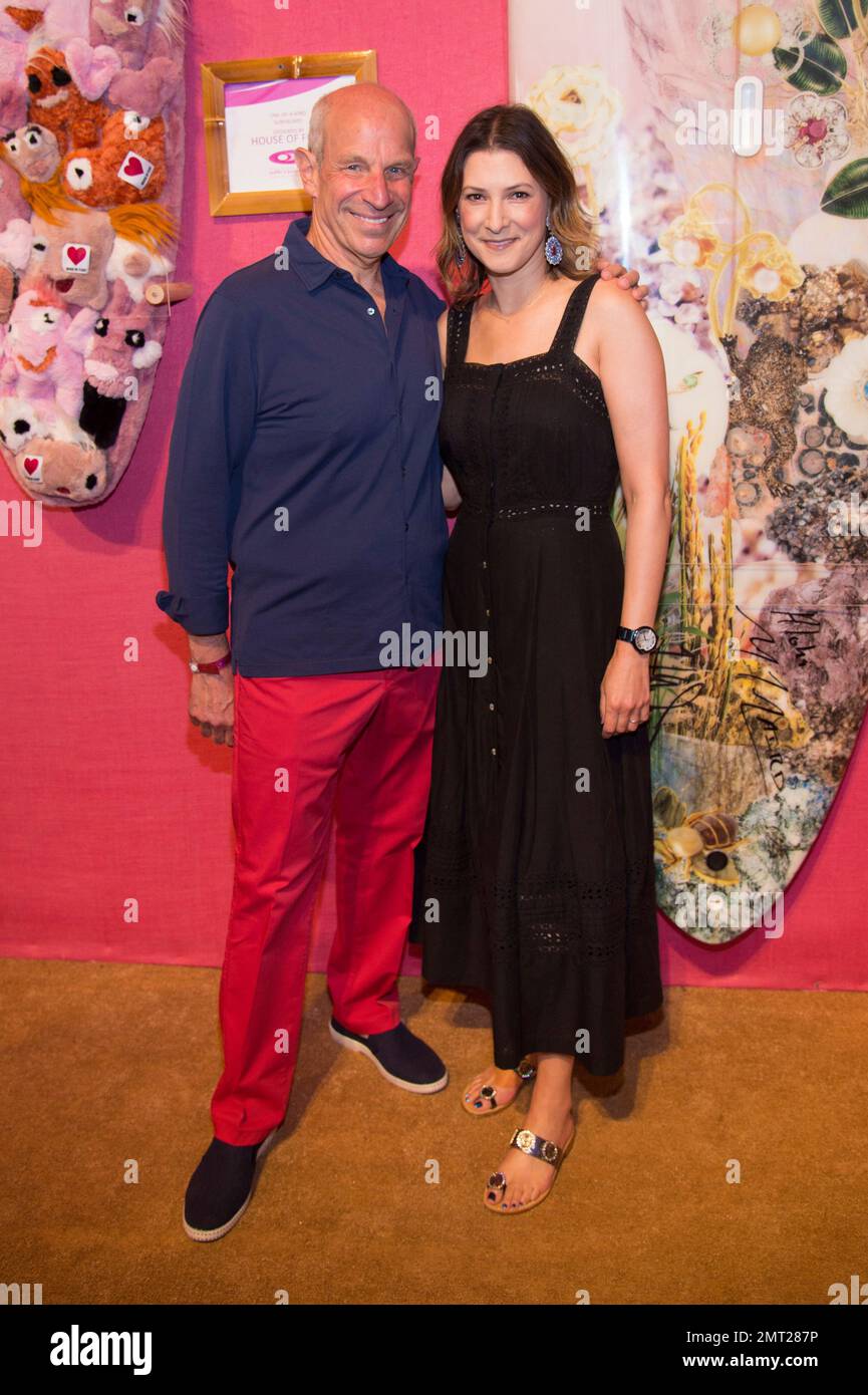 Jonathan Tisch, left, and Lizzie Tisch attend the 2017 Hamptons Paddle ...