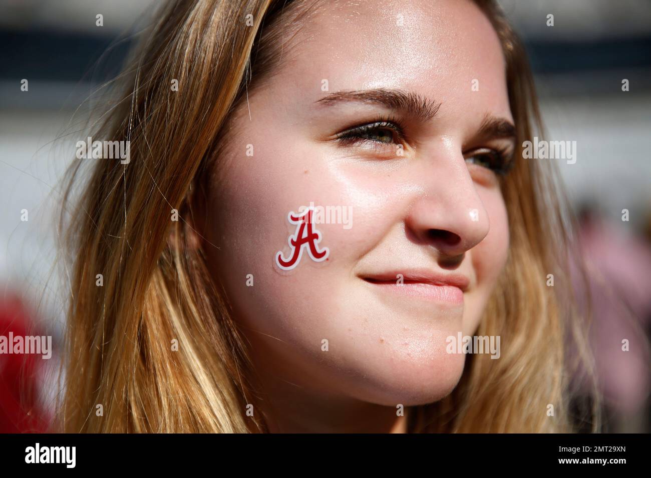 Ariel Stringfellow, 17, of Leeds, Ala., waits in line to get an ...