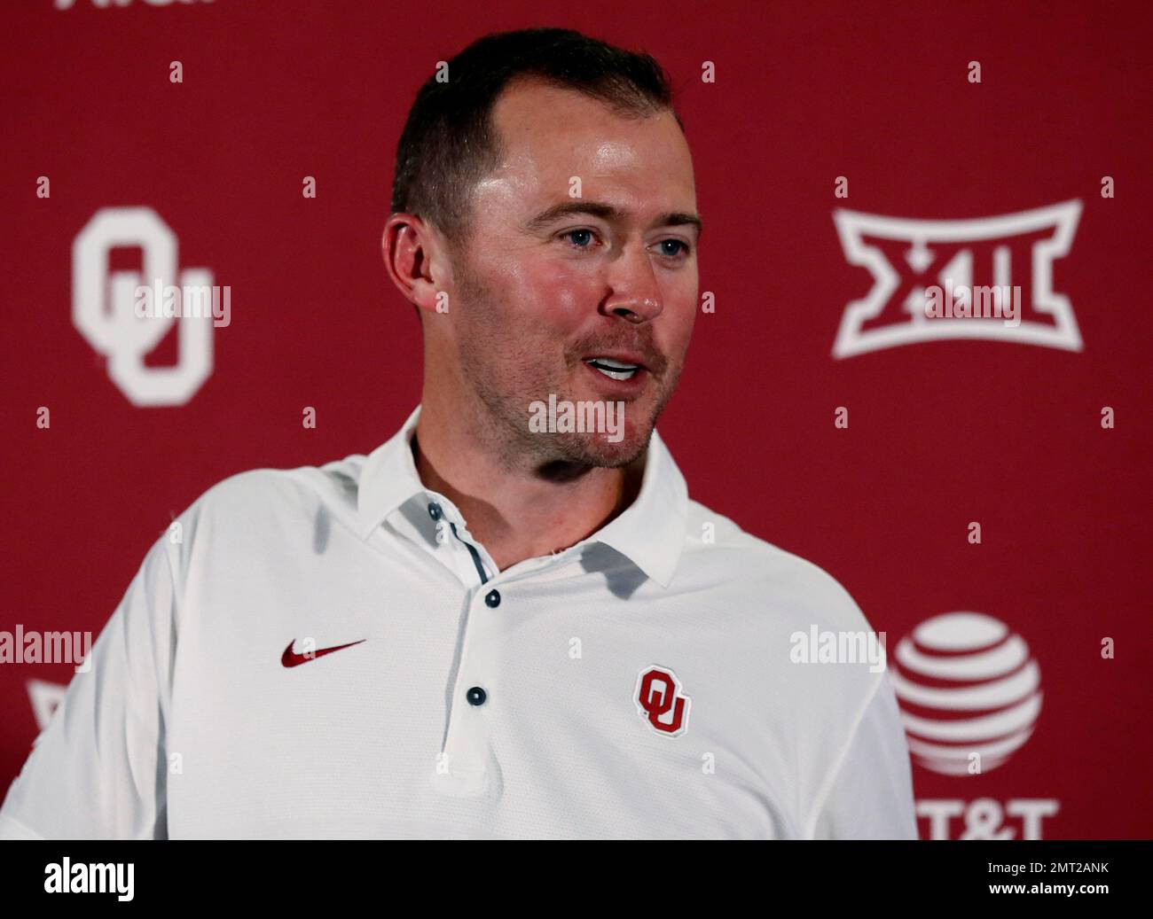 Oklahoma head coach Lincoln Riley answers a question during an NCAA ...