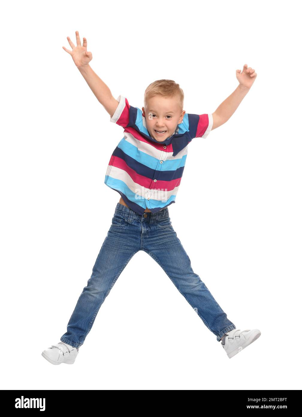 Cute little boy jumping on white background Stock Photo - Alamy