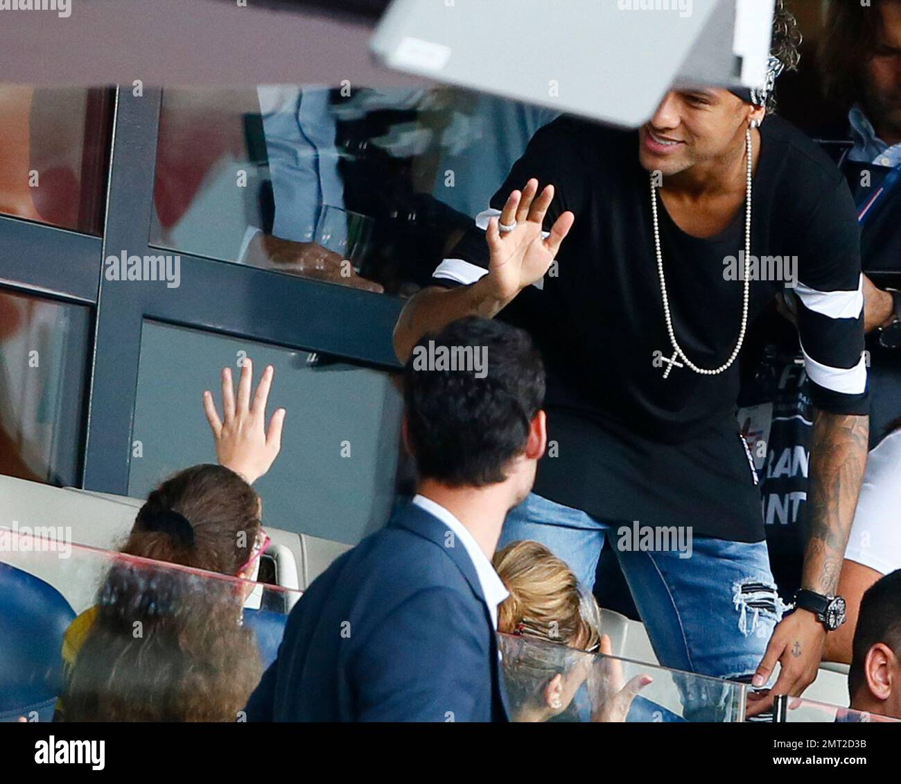 Brazilian soccer star Neymar salutes his fans at the Parc des Princes ...