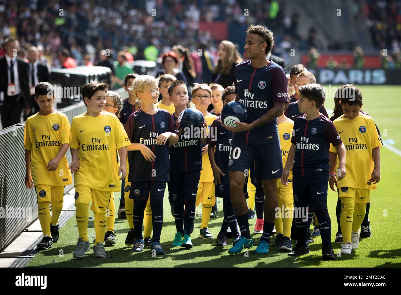 Brazilian soccer star Neymar walks on the pitch at the Parc des Princes ...