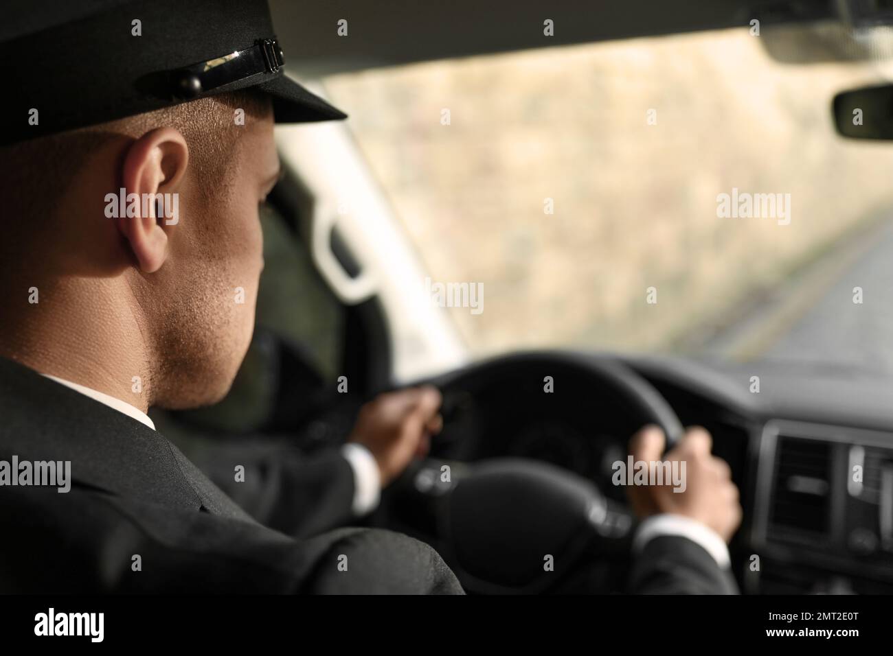 Professional driver in luxury car, closeup. Chauffeur service Stock ...