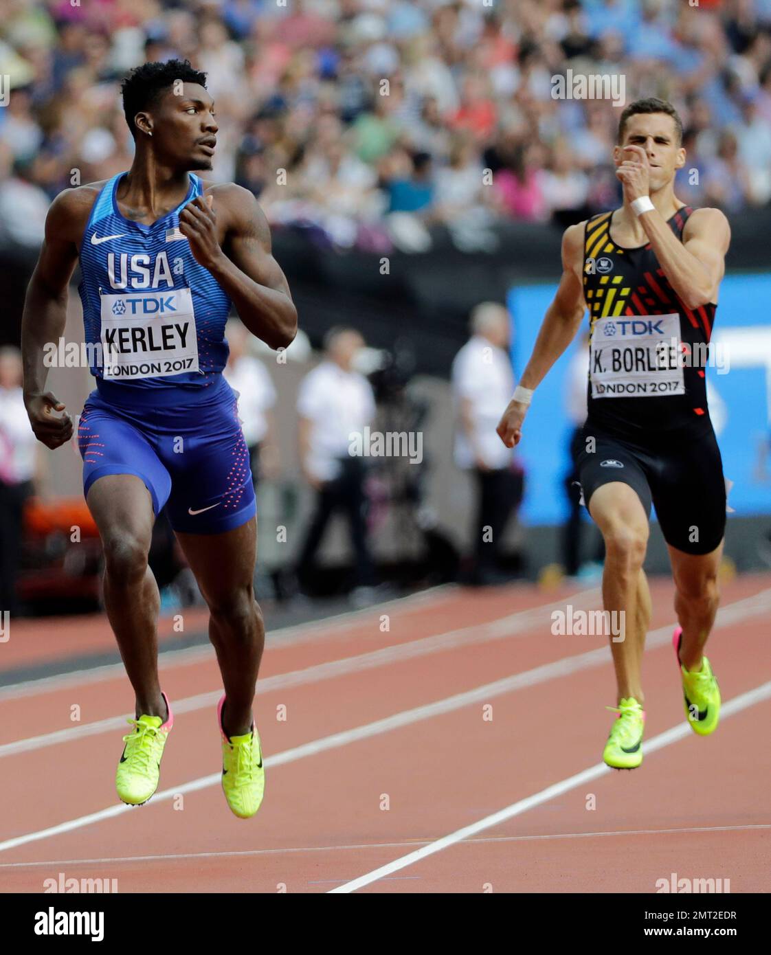United States' Fred Kerley, left, looks across at Belgium's Kevin ...
