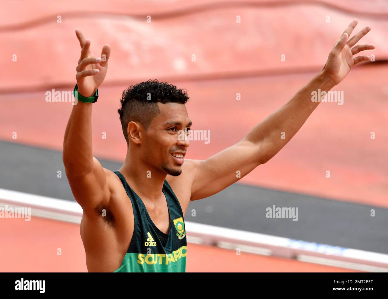 South Africa's Wayde Van Niekerk waves before a men's 400-meter heat ...