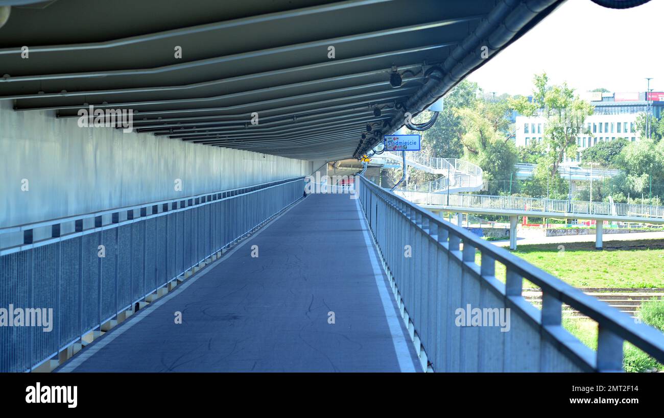Bicycle path and sidewalk through the highway bridge Stock Photo - Alamy