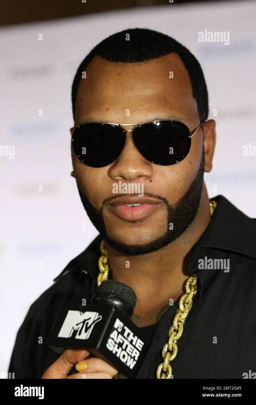 Flo Rida arrives at the Miss Universe pageant at the Atlantis Resort ...