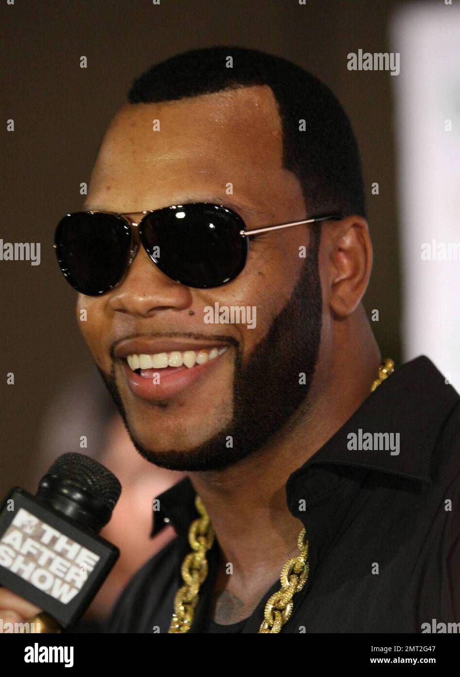 Flo Rida arrives at the Miss Universe pageant at the Atlantis Resort ...