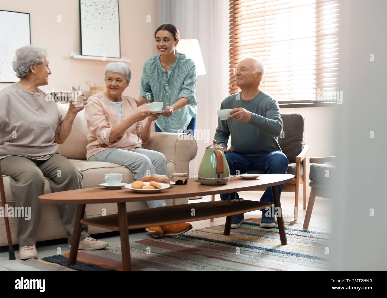 Taking care of elderly hi-res stock photography and images - Alamy