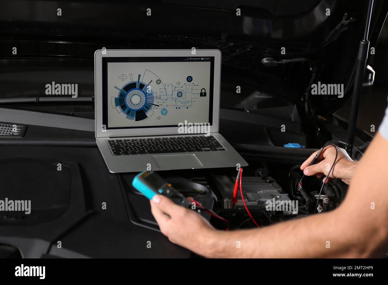 Mechanic with laptop near auto, closeup. Modern car diagnostic Stock ...