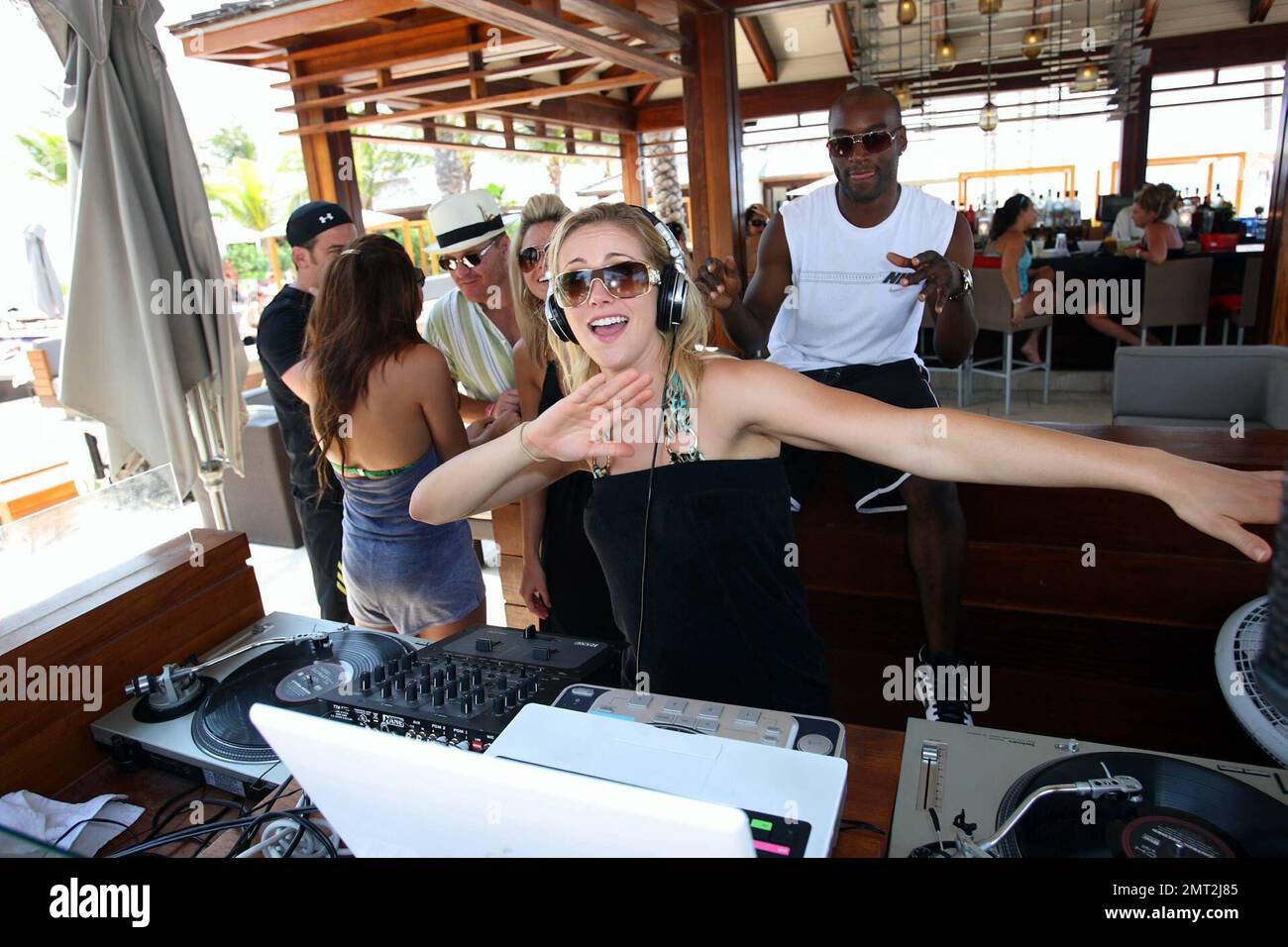 Exclusive!! L-R Miss Missouri Candace Crawford with DJ Frank Delour at the DJ booth at Cain at ...