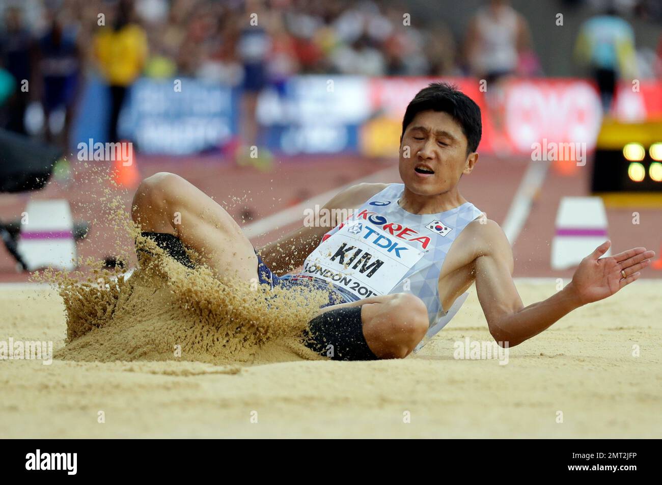 South Korea's Kom Deokhyeon competes in men's long jump qualification ...
