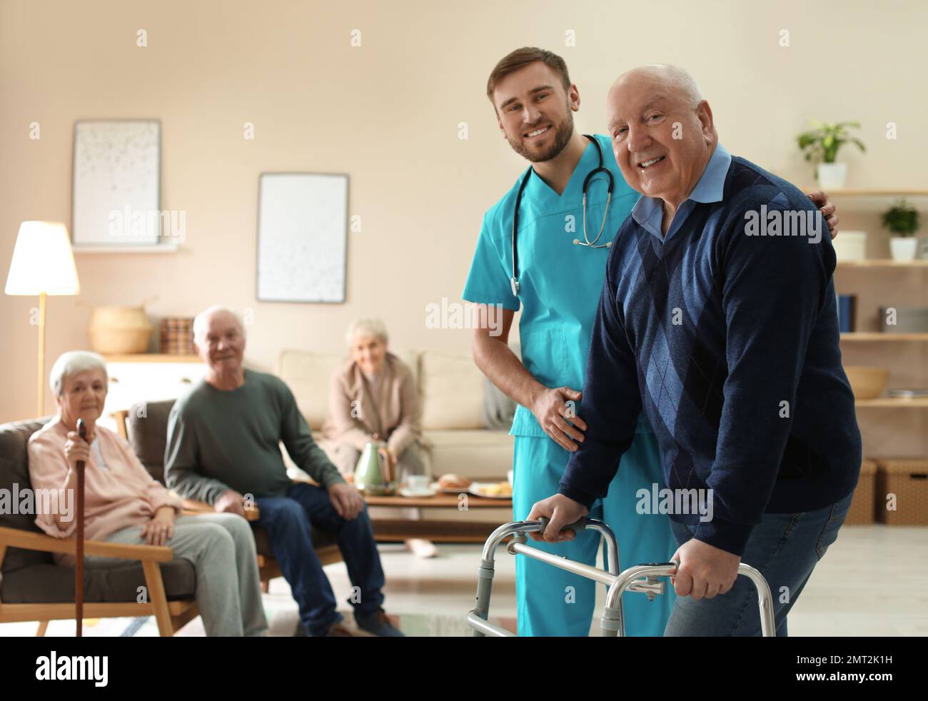 Helping an elderly man hi-res stock photography and images - Alamy