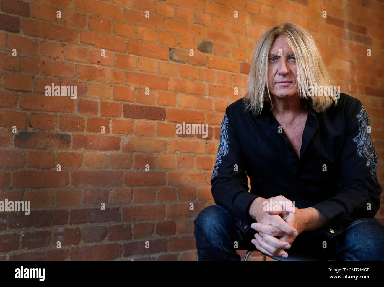 Joe Elliott lead singer of English rock band Def Leppard, poses for a ...