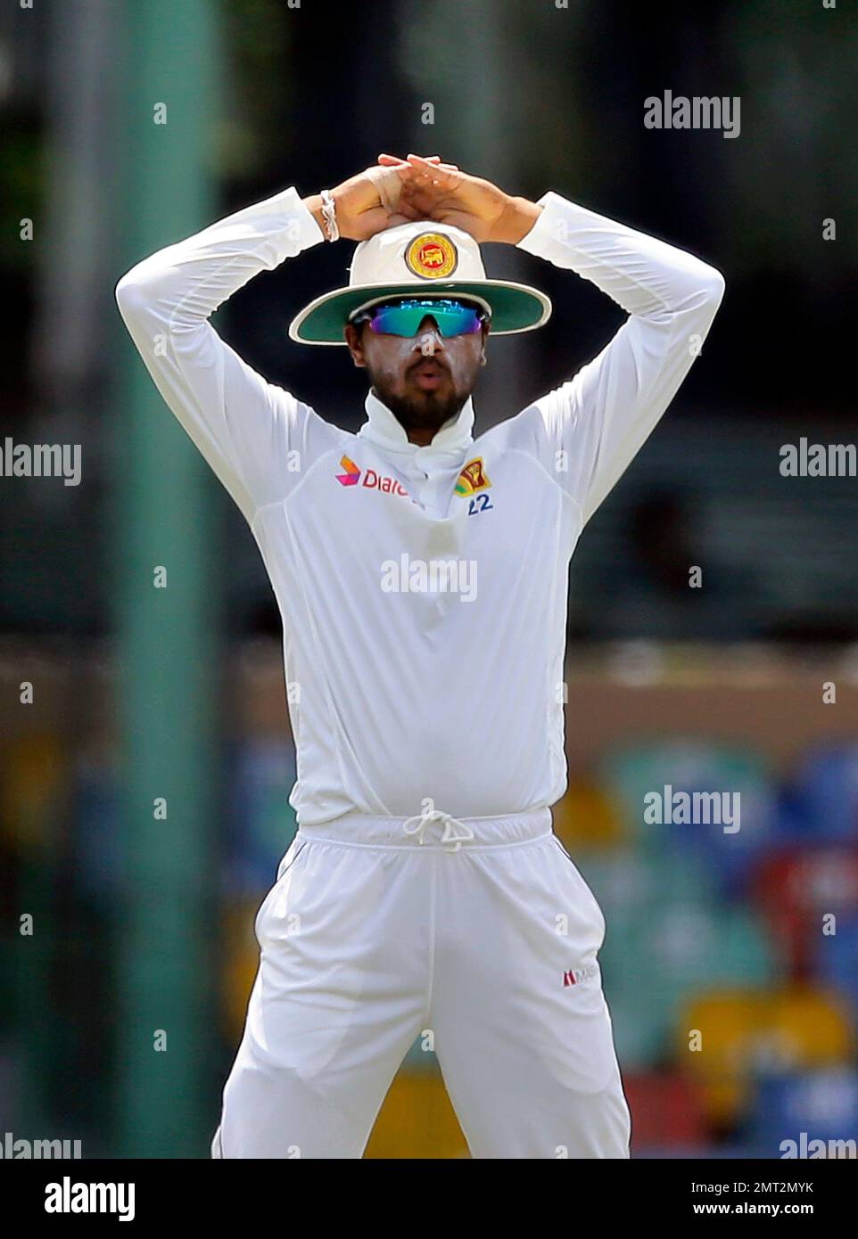 Sri Lanka's captain Dinesh Chandimal reacts to a delivery during their ...