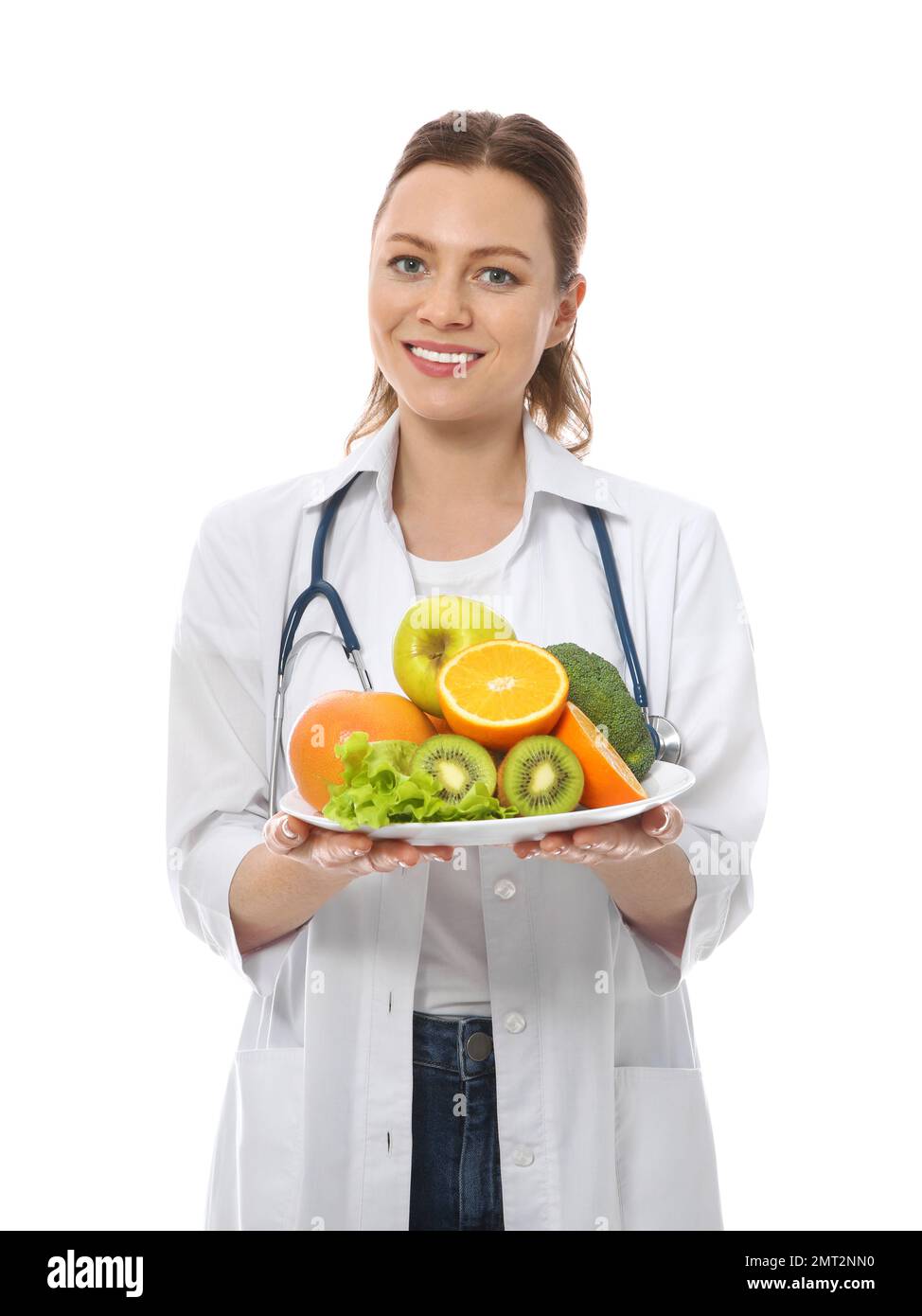 Nutritionist with fruits and vegetables on white background Stock Photo ...