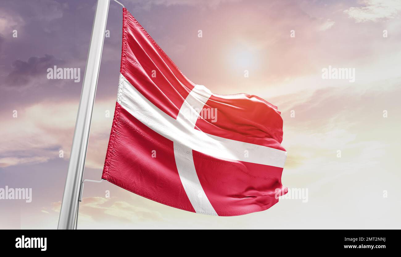 denmark waving flag in beautiful sky Stock Photo - Alamy