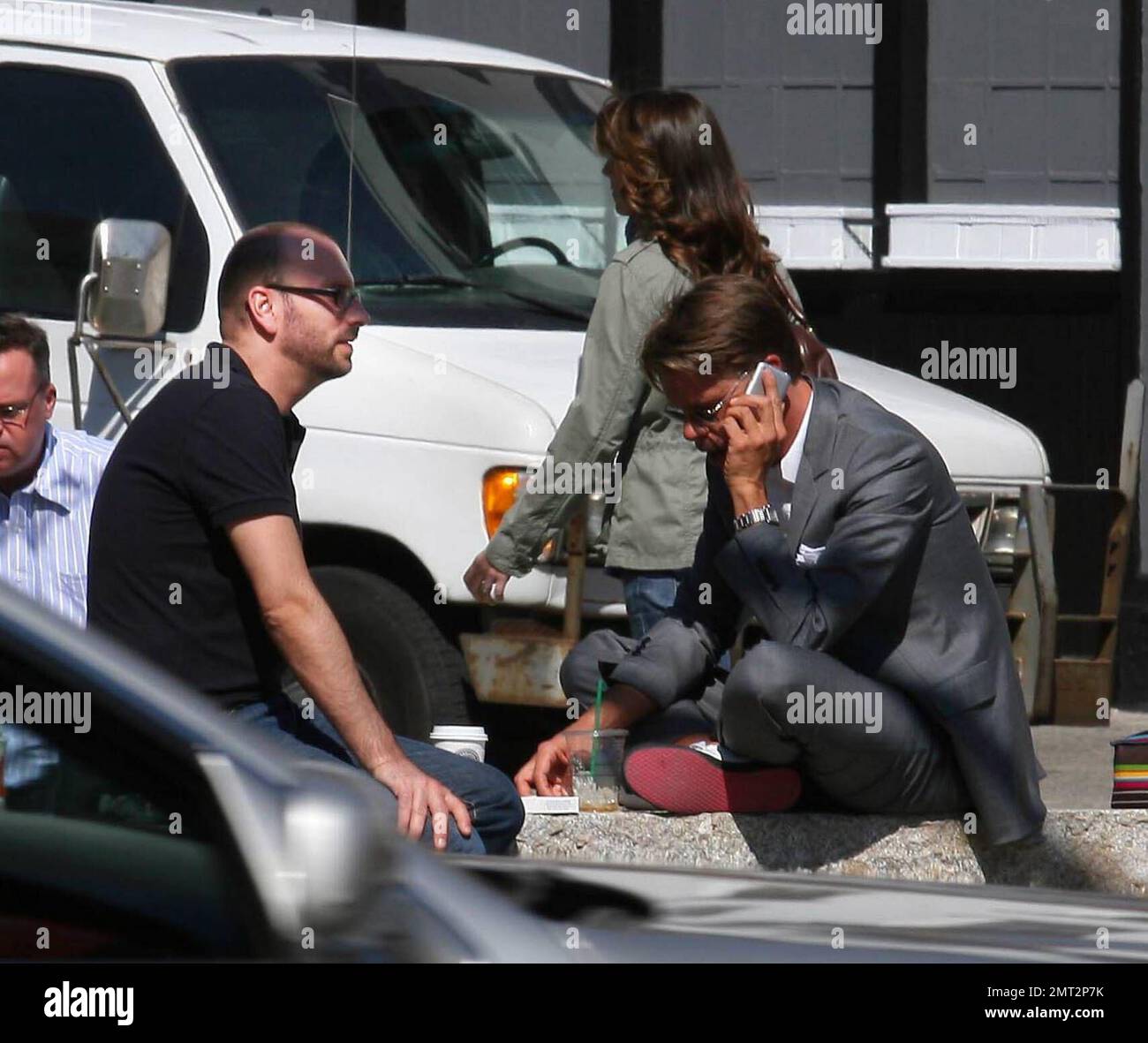 Exclusive!! Moby takes a meeting with a friend sitting on a wall in ...
