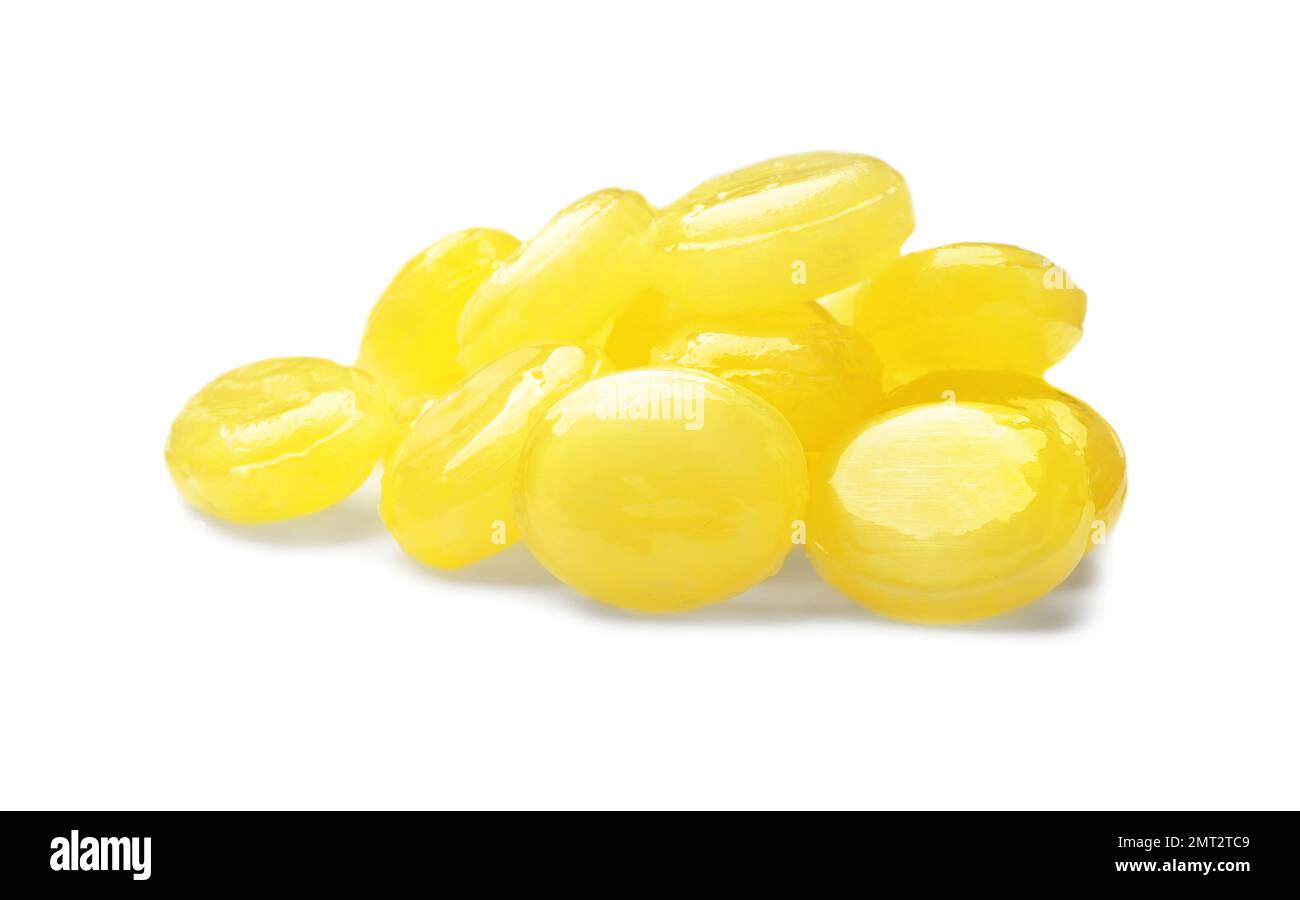 Tasty small lemon drops isolated on white Stock Photo - Alamy