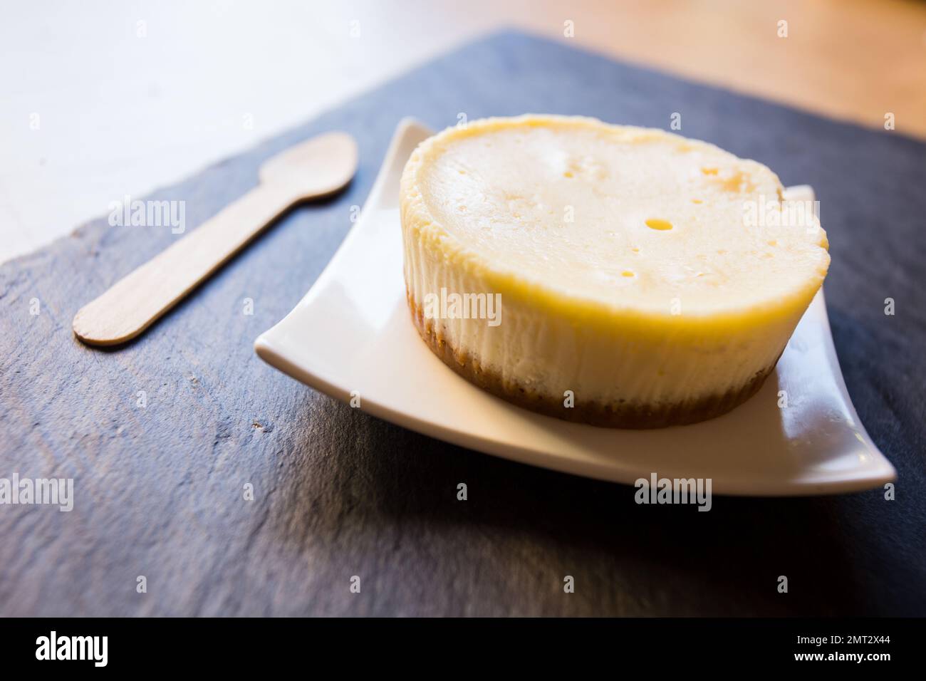New York Cheesecake with cookie base Stock Photo - Alamy