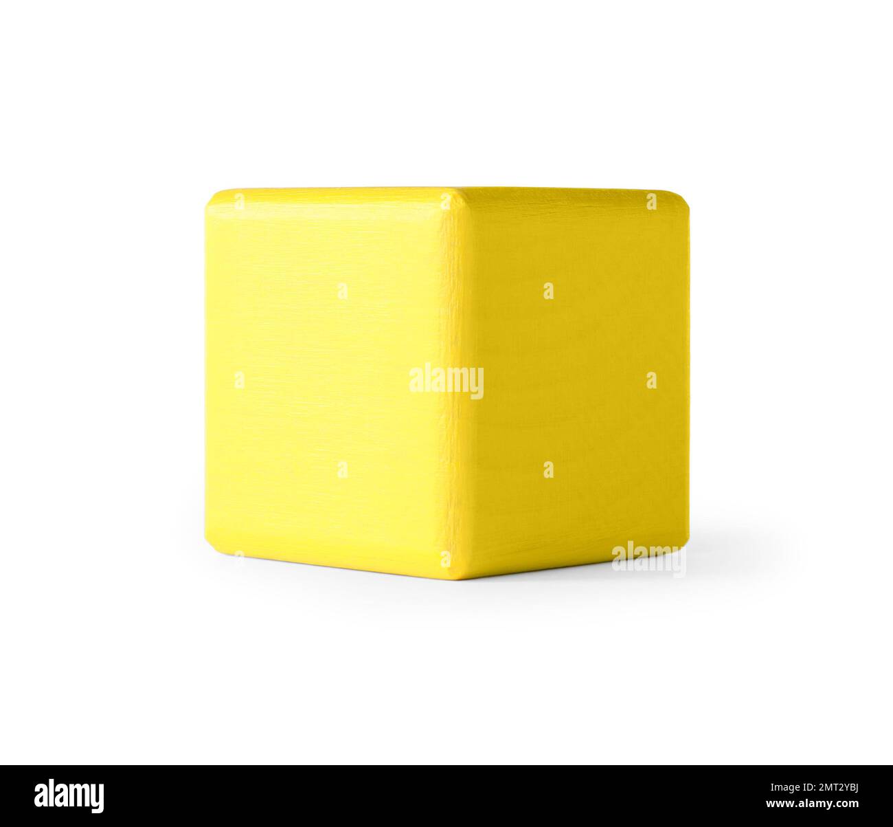 Yellow wooden toy cube isolated on white Stock Photo - Alamy