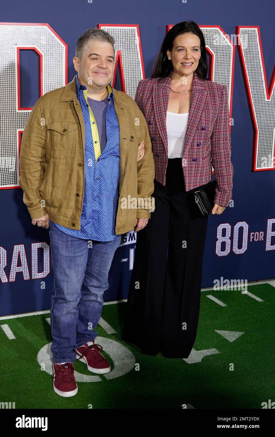 Patton Oswald and Meredith Salenger pose together at the premiere of ...