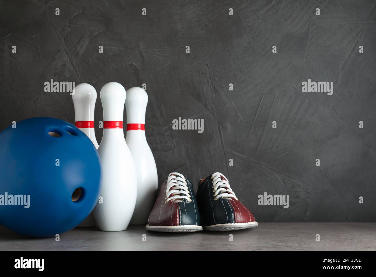 Bowling pins on grey hi-res stock photography and images - Alamy