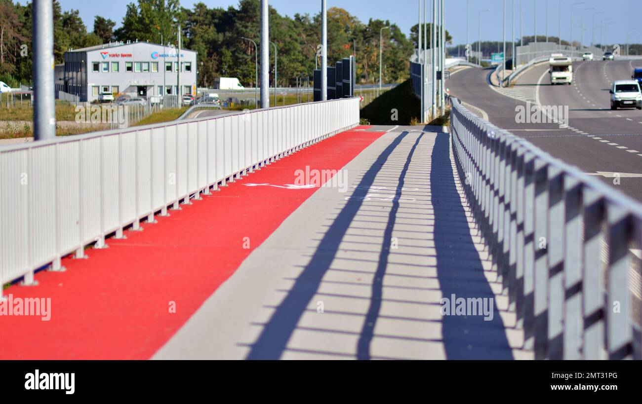 Bicycle path and sidewalk through the highway bridge Stock Photo - Alamy