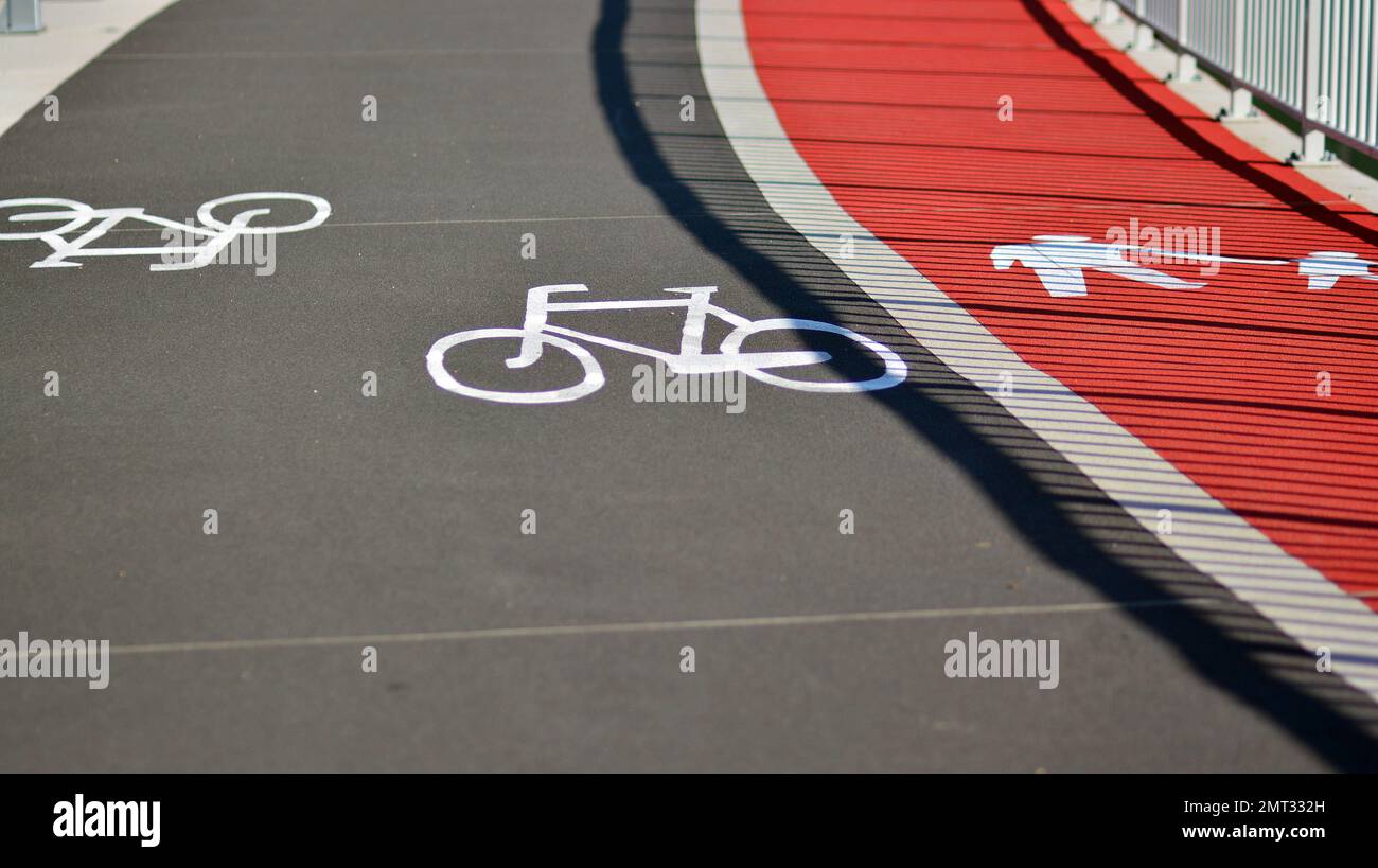 Bicycle path and sidewalk through the highway bridge Stock Photo - Alamy