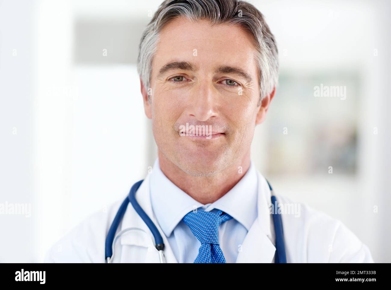 Your health is my priority. Portrait of a doctor standing in a hospital corridor Stock Photo - Alamy