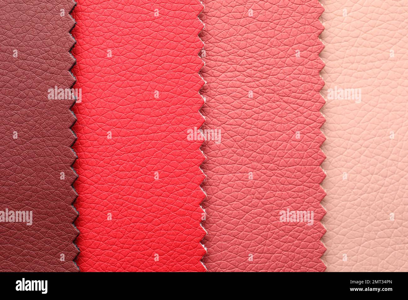 Leather samples of different colors for design as background, closeup ...