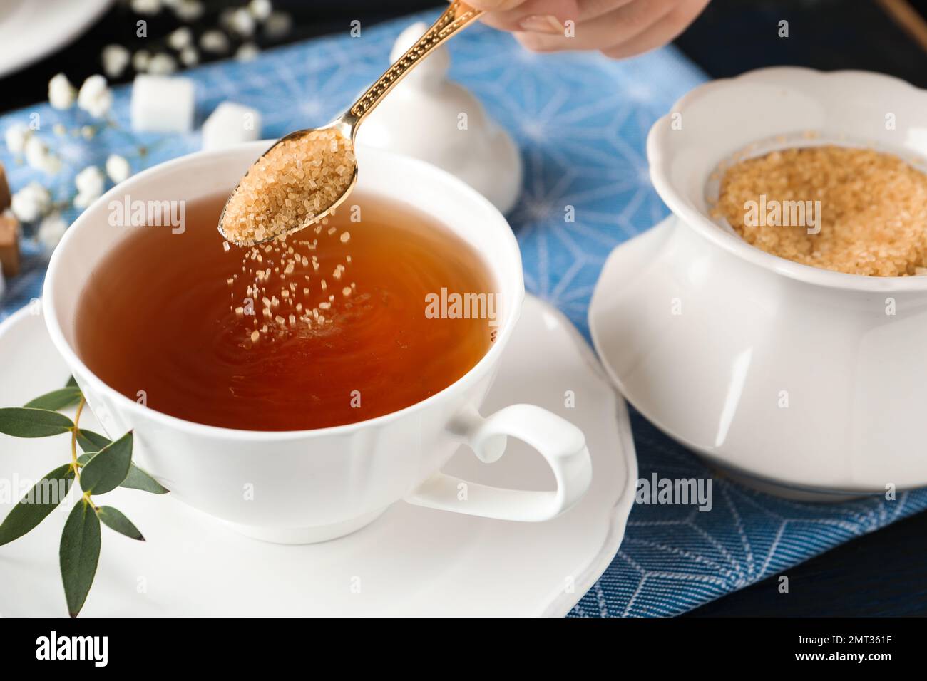 Woman spoon sugar tea hi-res stock photography and images - Alamy