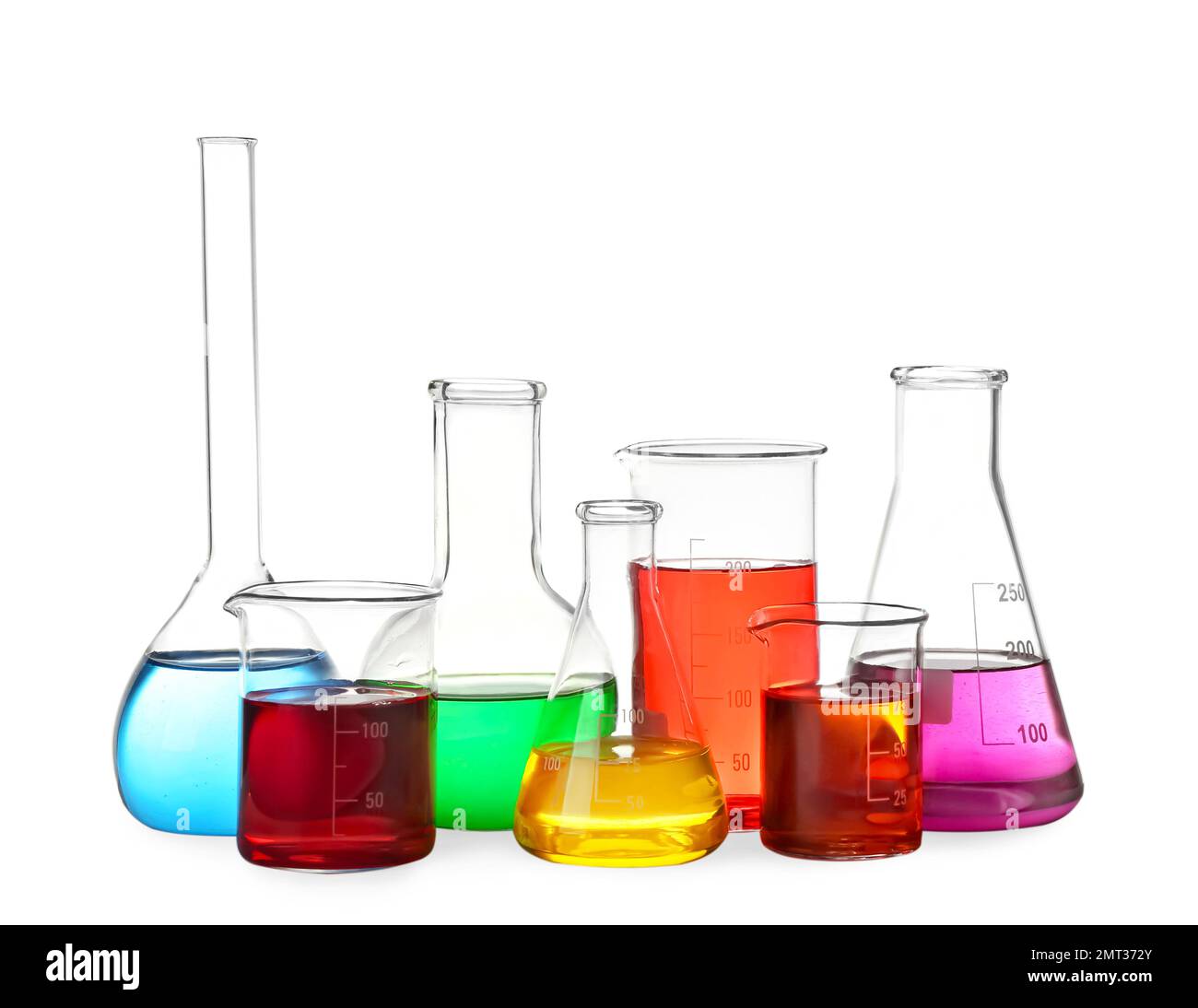 Different laboratory glassware with colorful liquids isolated on white ...
