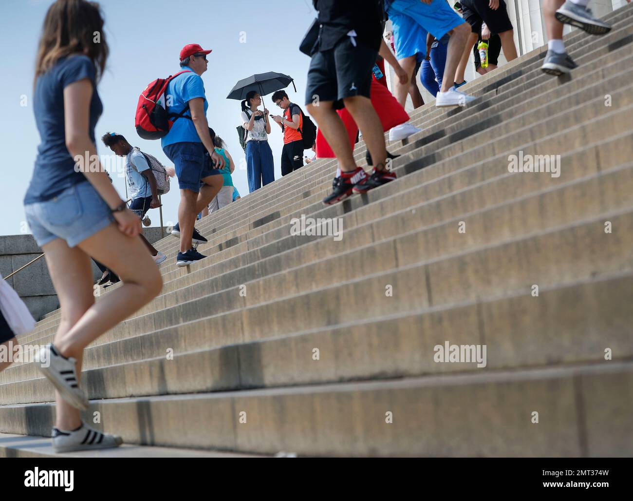 People are seen walking up and down the steps during a visit to the ...