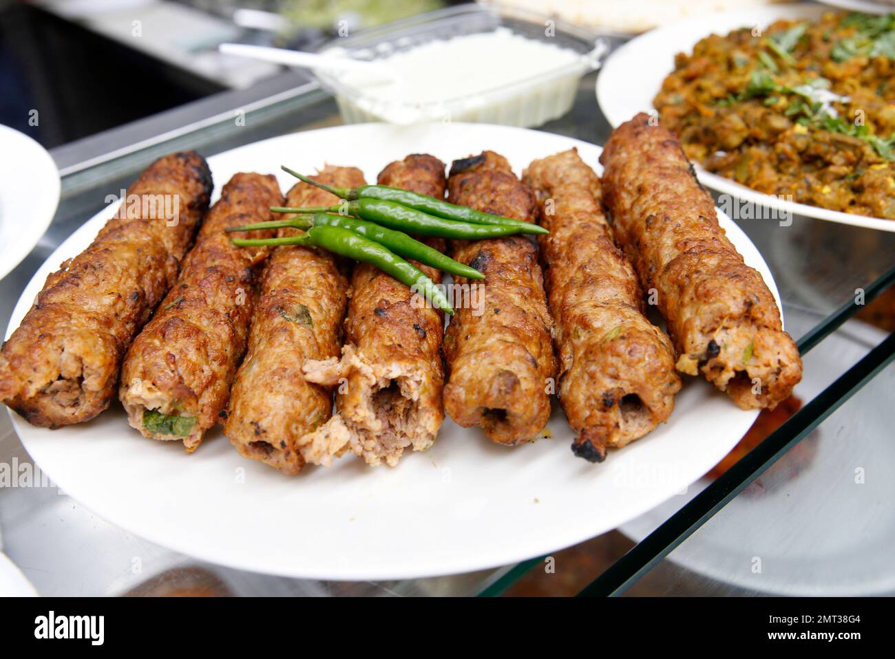 In this Thursday, July 20, 2017 photo, spicy chicken kebabs from ...