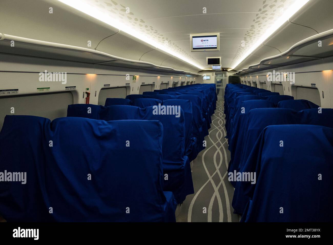 Rows of passenger seats stand inside a Guangzhou-Shenzhen-Hong Kong ...