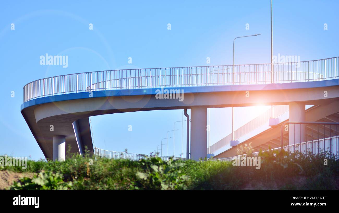 Bicycle path and sidewalk through the highway bridge Stock Photo - Alamy