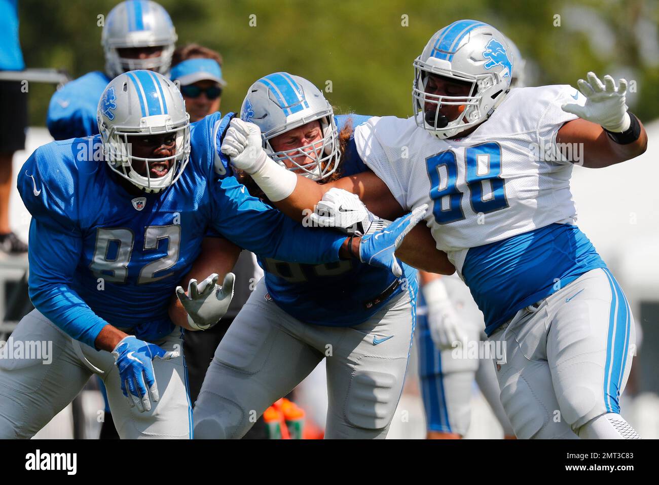 Detroit Lions tight end Brandon Barnes, from left, and offensive tackle ...