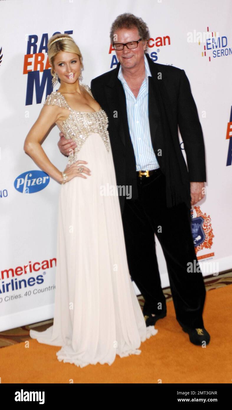 Paris Hilton and her father Rick Hilton attend the 18th Annual Race to ...