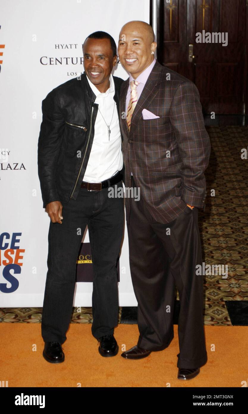 Sugar Ray Leonard and Hines Ward attend the 18th Annual Race to Erase ...