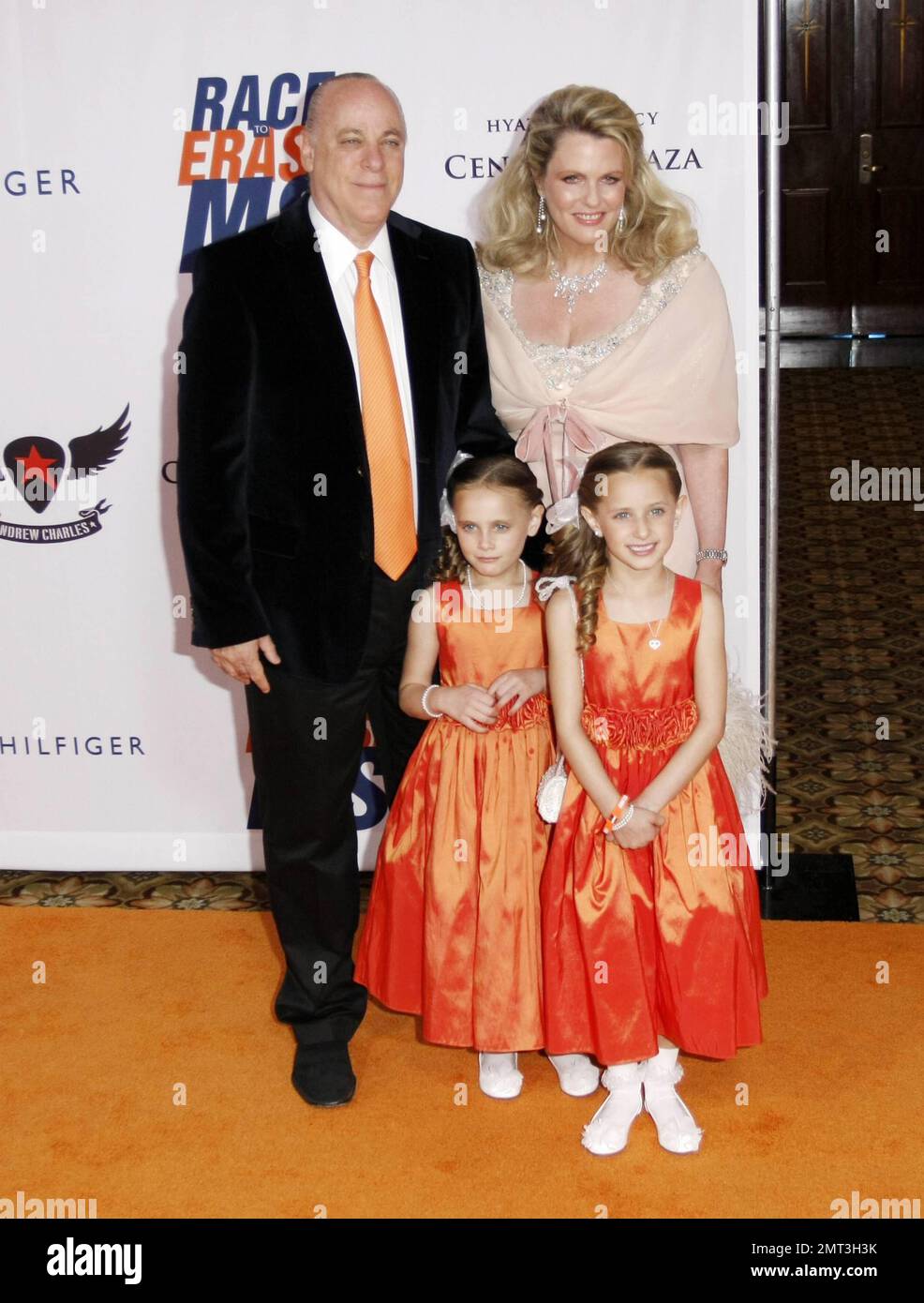Co-Chair Nancy Davis with husband Ken Rickel and daughters attend the ...