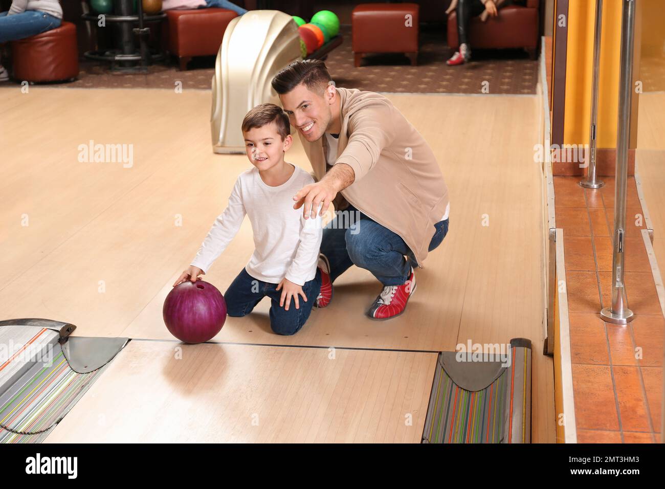 Father son bowling hi-res stock photography and images - Alamy