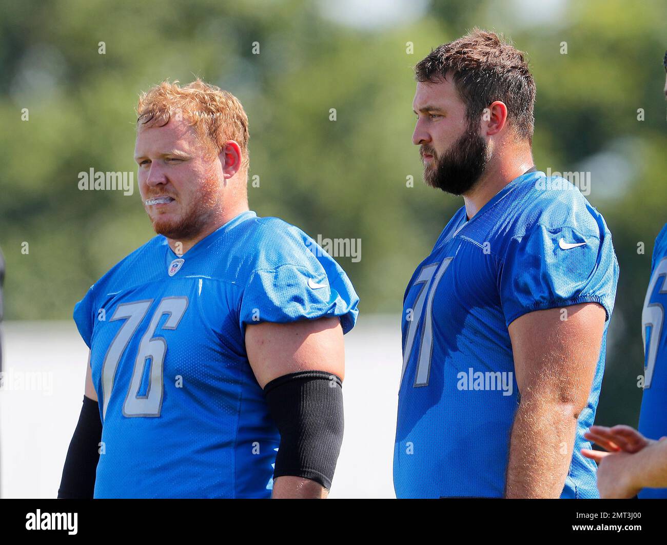Detroit Lions offensive guard T.J. Lang (76) and offensive tackle Ricky ...