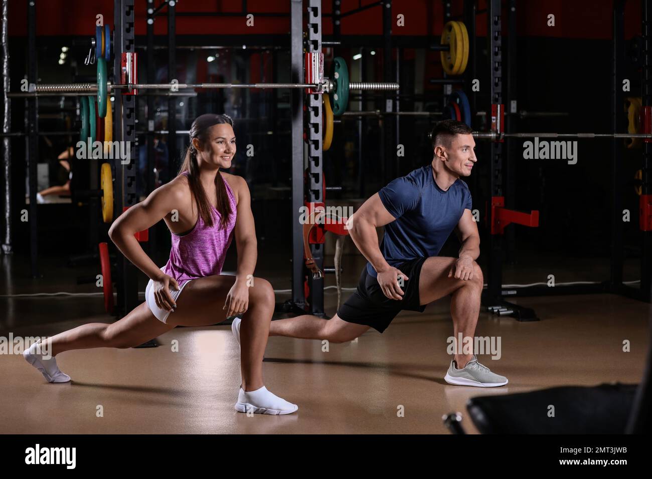 Muscular woman stretching in crossfit hi-res stock photography and ...