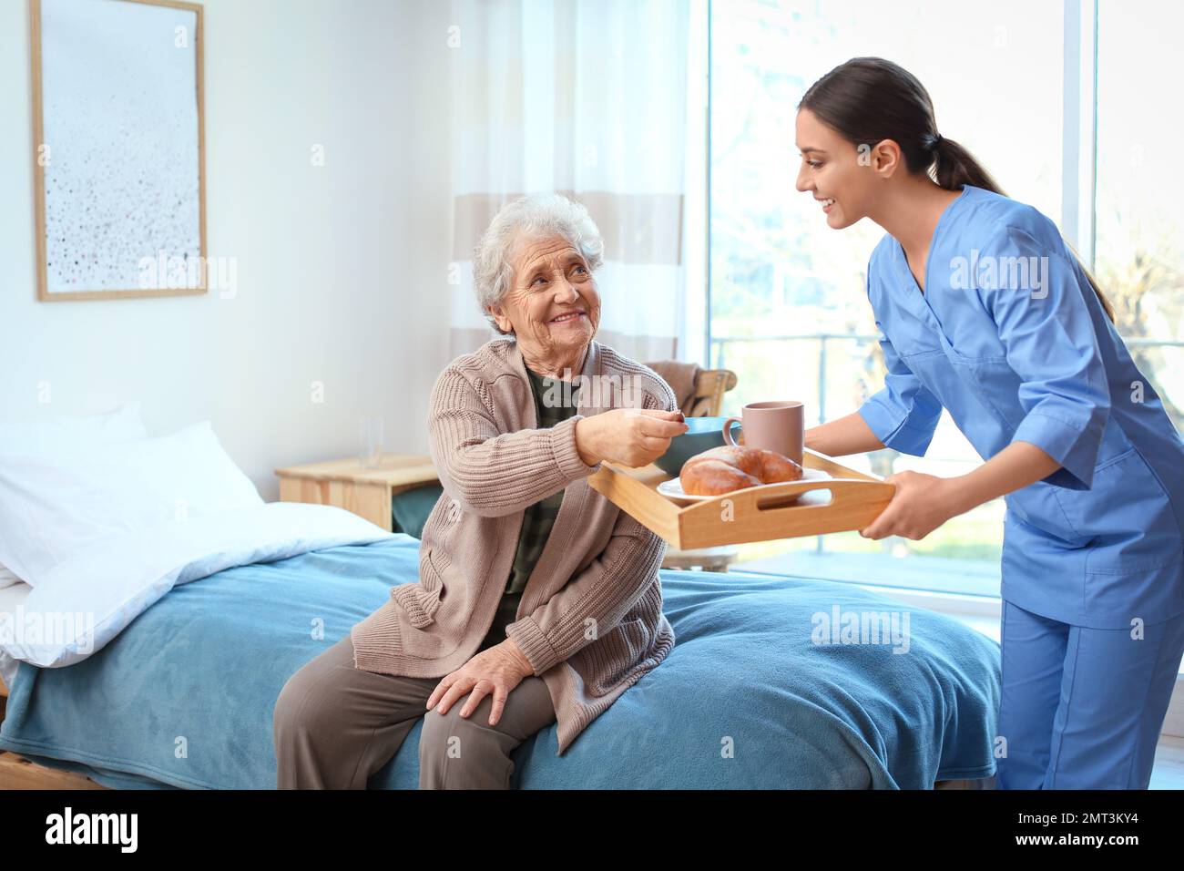 Care worker food disabled hi-res stock photography and images - Alamy