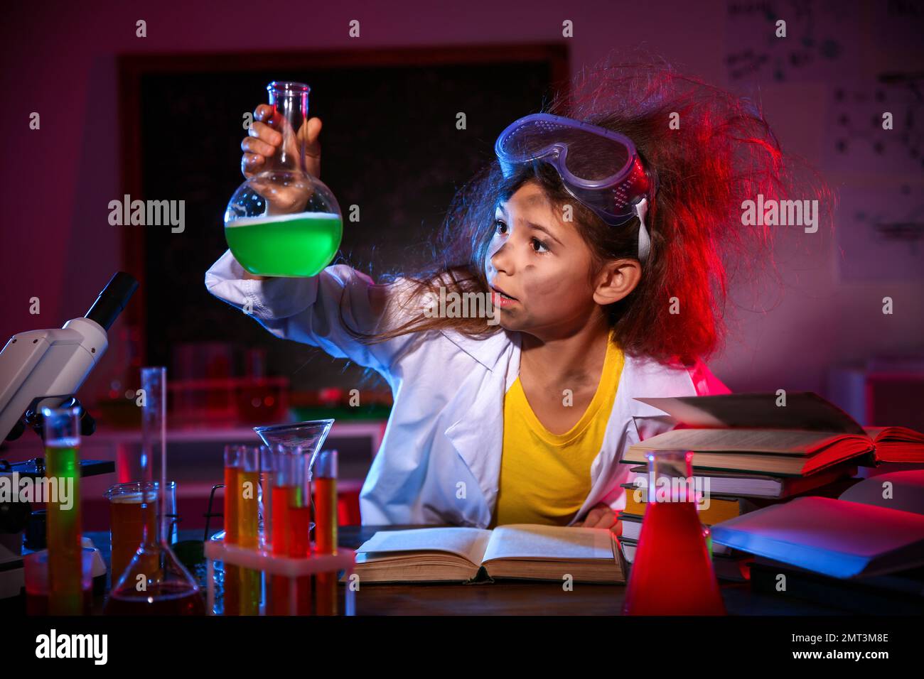 Child doing chemical research in laboratory. Dangerous experiment Stock ...